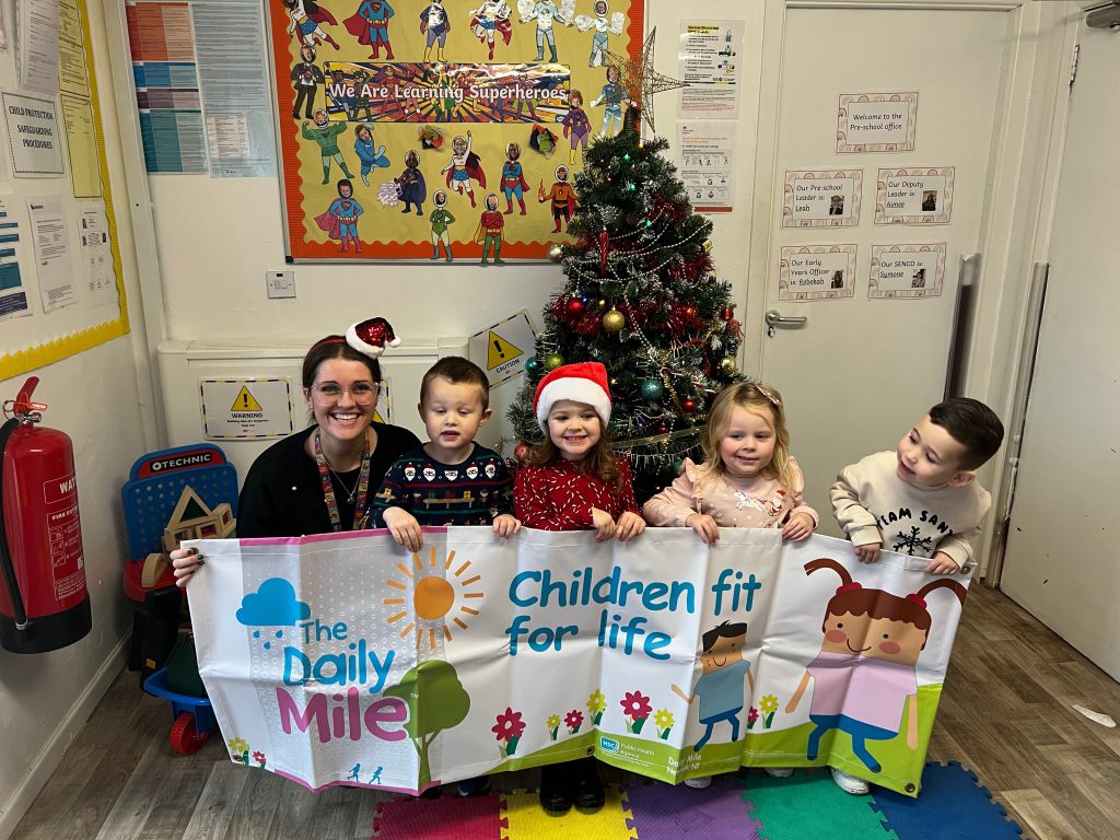 Local Children Don Christmas Jumpers and Take Part in ‘Daily Mile Santa ...